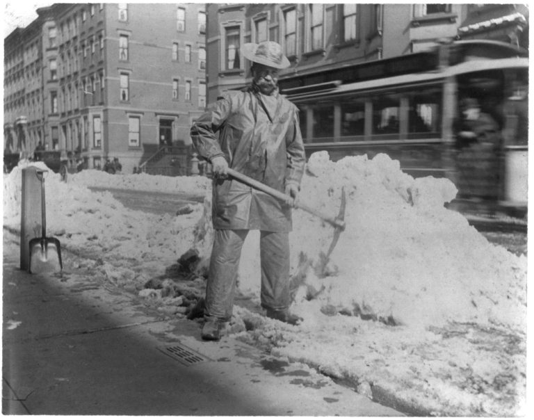Street types of New York City-Street cleaner with pick ax standing in ...